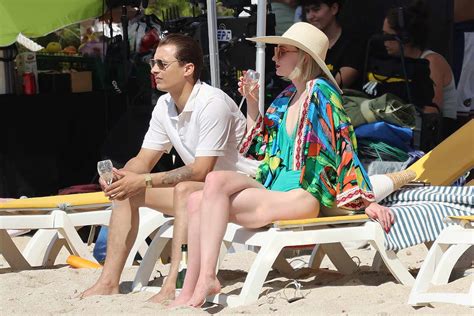 Sophie Turner Wore Plunging Teal Swimsuit On Movie Set Get The Look