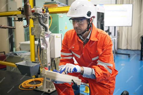 Premium Photo Robotics Control Engineers Solve Problems And Setting