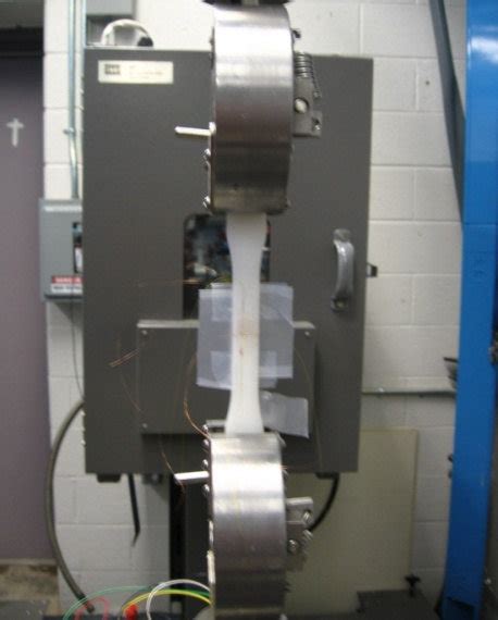 Tension Test Sample In Instron Test Machine Download Scientific Diagram