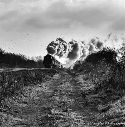 Photos As Steam Locomotive 6233 Duchess Of Sutherland Passes Through