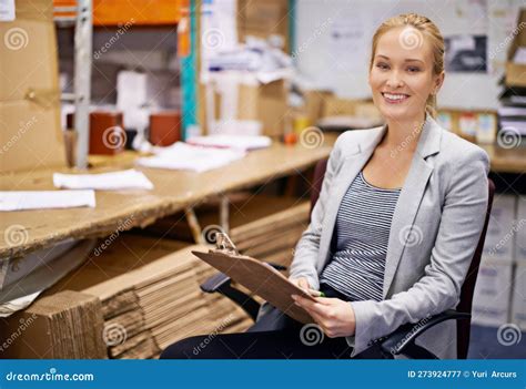 Shes Always Available An Attractive Young Woman Sitting At Her Desk In