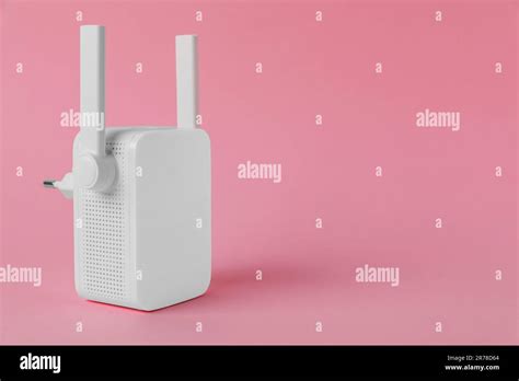 New Modern Wi Fi Repeater On Pink Background Space For Text Stock