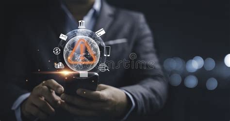 Businessman Using Smartphone With Red Triangle Caution Warning Sign For