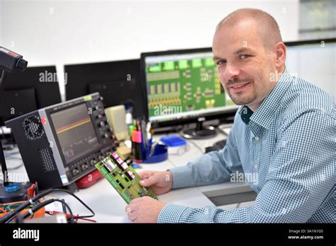 Engineer At The Workplace Assembly And Development Of Electronics In