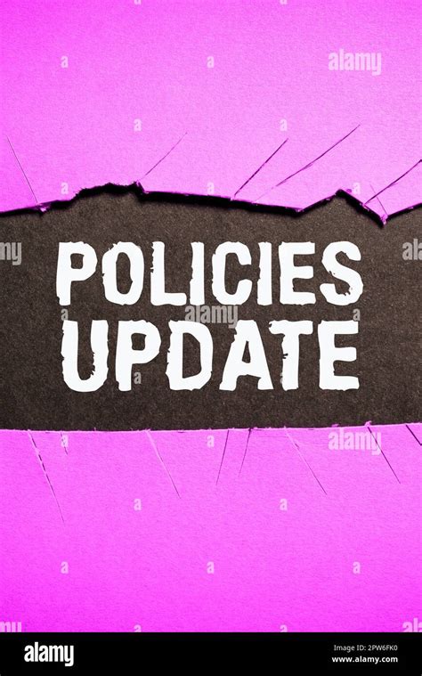 Hand Writing Sign Policies Update Business Concept Act Of Adding New