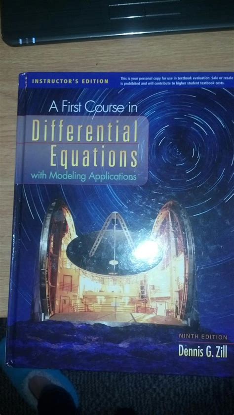 First Course In Differential Equations With Modeling Applications 9th 09 By Zill Dennis G