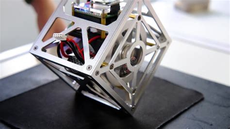 Engineer Presenting Robotic Balance Cube In Slow Motion Stock Footage