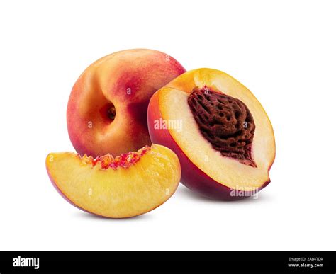 Smooth Skinned Whole Nectarine One Half With Kernel And One Unpitted
