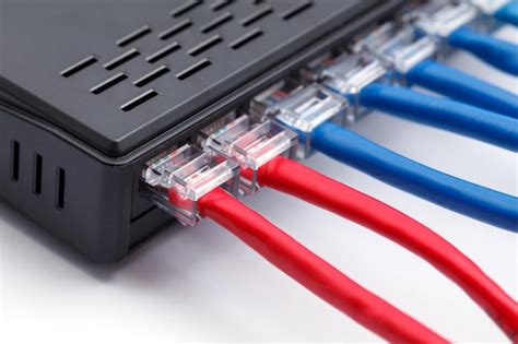 Premium Photo Lan Network Switch With Ethernet Cables Plugged In