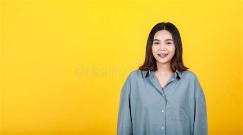 Lovely Asian Girl Standing Straight To Play Lively Cutout Portrait Of