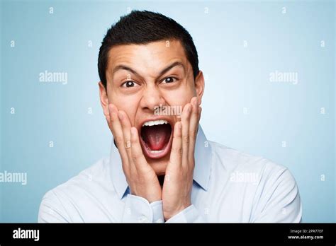 Scream Until Youre Blue In The Face Shot Of A Young Man Screaming