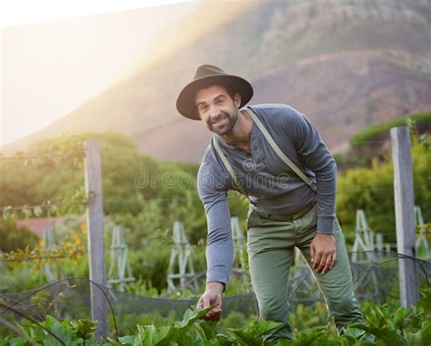I Couldnt Imagine A Day Without Farming Portrait Of A Young Man Tending To The Crops On A Farm