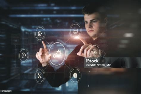 A Programmer Develops A Program On A Virtual Computer Screen Stock