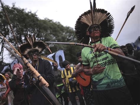 Brazils Indigenous People Protest As Lawmakers Vote To Limit Their