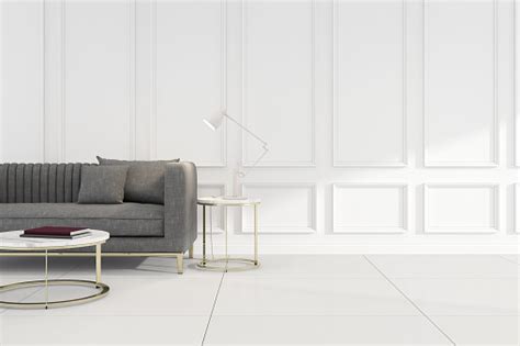 회색 패브릭 소파와 클래식 패널 벽에 둥근 마블 사이드 테이블이있는 거실의 전망 골드 장식 인테리어 디자인의 관점 3d 렌더링 거실에 대한 스톡 사진 및 기타 이미지