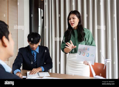 Esg Presentation In Corporate Meeting Professional Team Discussing