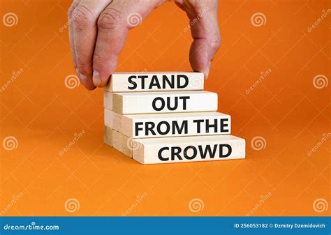 Stand Out From The Crowd Symbol Concept Words Stand Out From The Crowd On Wooden Blocks On