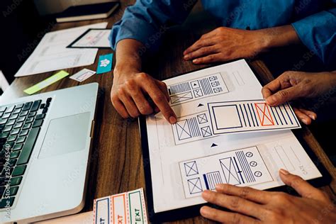 Creative Web Designer Planning Application And Developing Template Layout Framework For Mobile