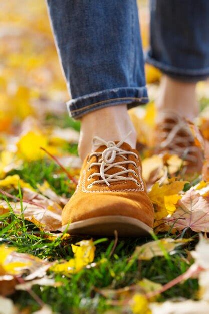 Premium Photo Women Shoes In Autumn Foliage