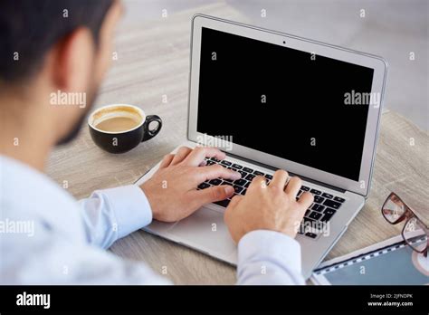 Back Of Businessman Typing On A Laptop Business Professional Working In His Office Businessman