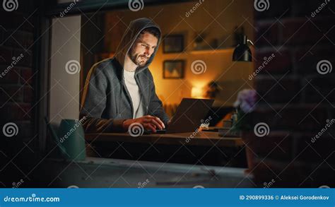 Professional Male Programmer Writing Code For Complex Project And Working Remotely On Laptop