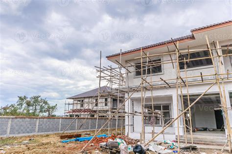 Construction Residential New House In Progress At Building Site