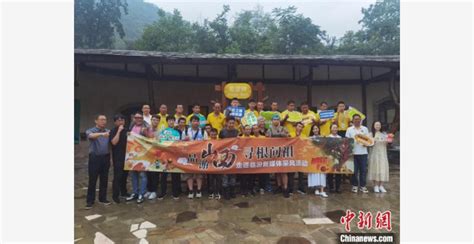 台湾青年变身“农夫”与身心障碍人士播撒“爱心种子”腾讯新闻