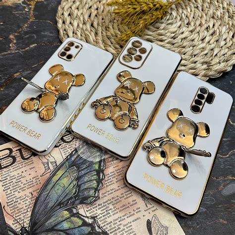 قاب گوشی سامسونگ ژله ای My Case مای کیس مدل خرس تدی طلایی برجسته محافظ لنز دار پاپ سوکت دار سفید