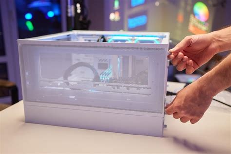 Premium Photo Closeup Of Technicians Hand Assembling Personal Computer