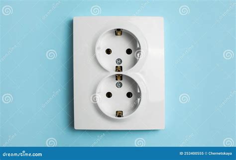 Double Power Socket On Light Blue Wall Electrical Supply Stock Image Image Of Double Home