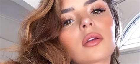 Demi Rose Wears Nothing Beneath Her Unbuttoned Jacket