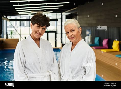 Two Lovely Mature Women Enjoy A Joyful Moment At A Wellness Center