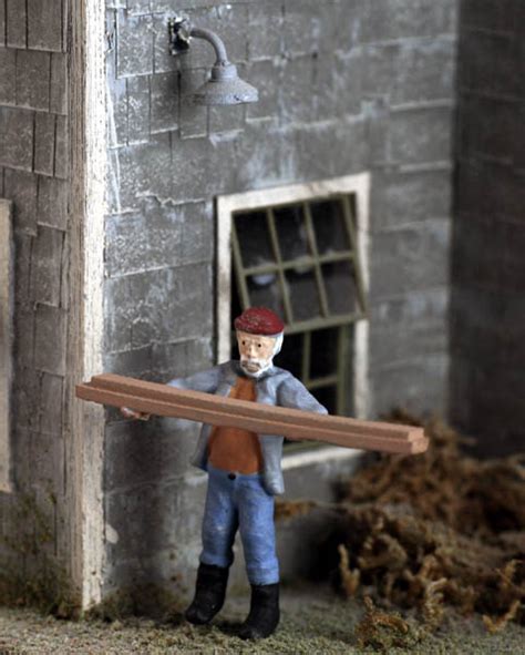O Scale Logger With Lumber Figure