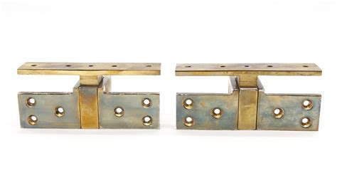 Pair Of Traditional Harmon Brass Pocketed Pivot Door Hinges Olde Good