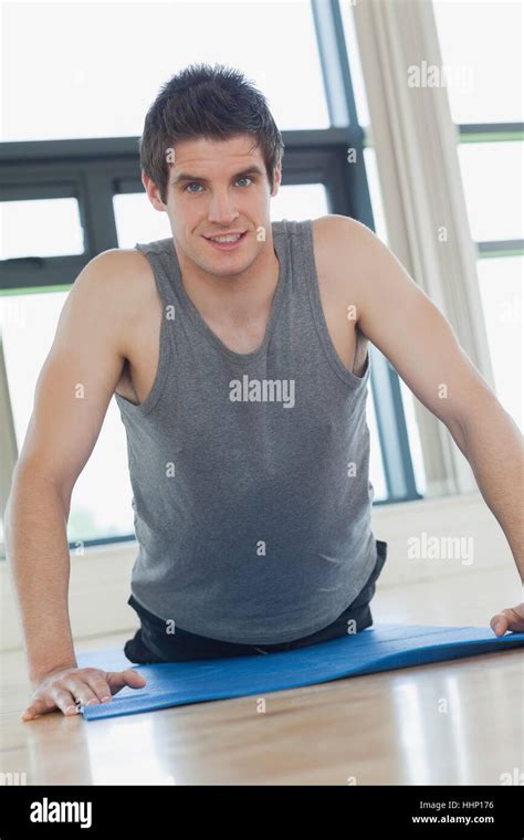 Man Doing Push Ups On The Floor At The Gym Stock Photo Alamy