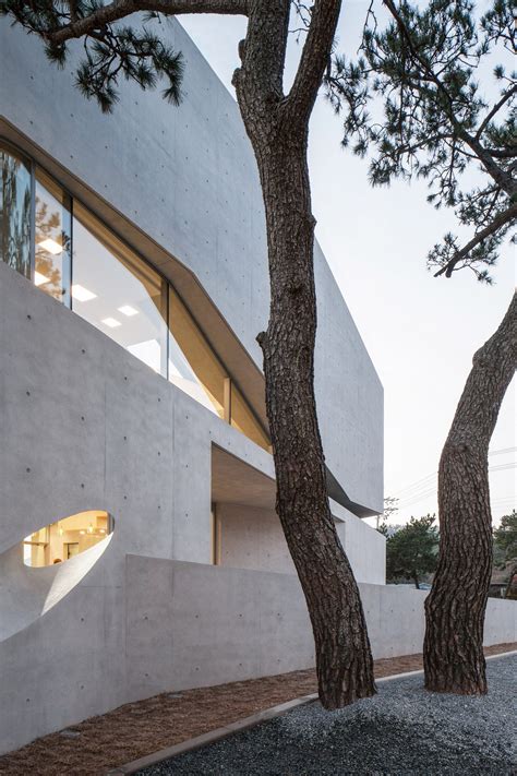 Stacked Concrete Blocks And Roof Deck Give Diners Sea Views At South Korean Cafe
