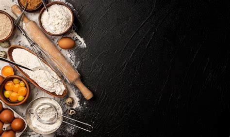 Premium Photo Baking Ingredients On Black Background Top View