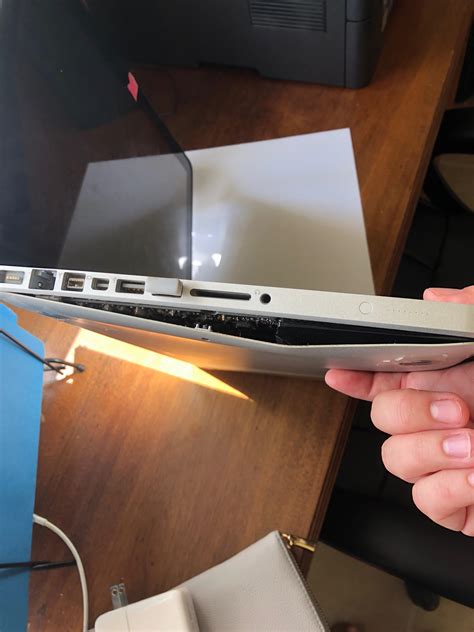 My Wifes Older MacBook Pro Just Popped While She Was Using It R Macbook