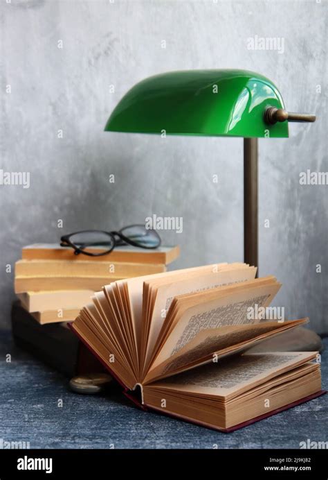 Simple Composition Still Life With Vintage Lamp And Book On A Desk Retro Styled Objects Close