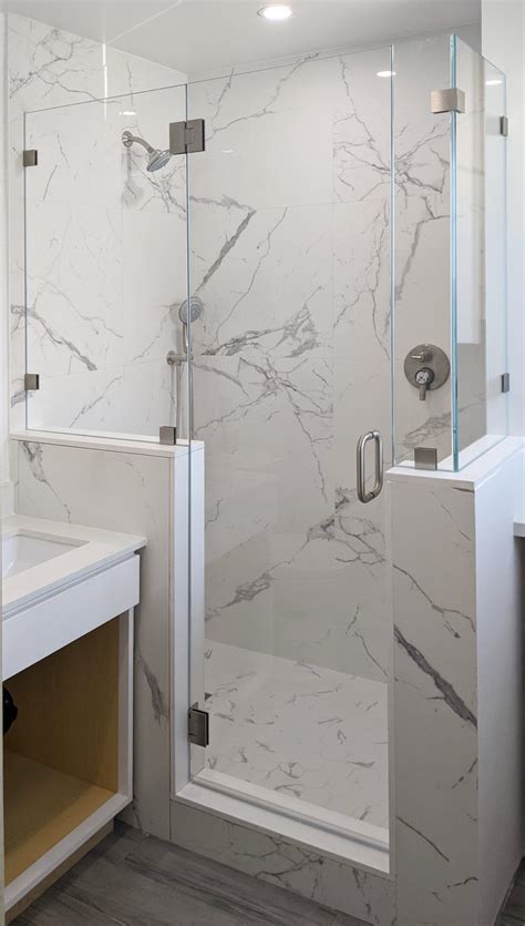 Frameless Shower Enclosures With A Pony Wall Blizzard Frameless