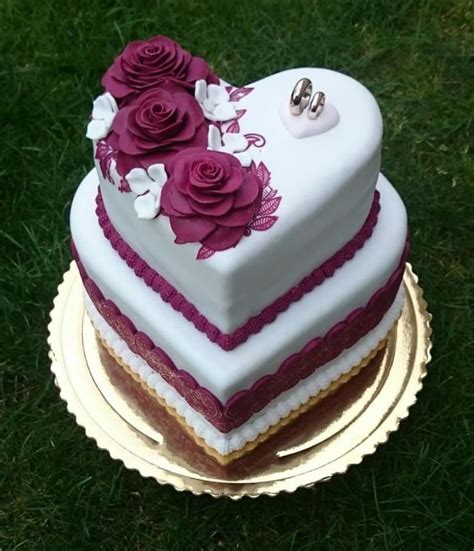 Heart Shaped Wedding Cake With Flowers And Rings Heart Wedding Cake