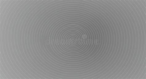 Concentric Circles Ripple Outward On A Gray Background Creating An
