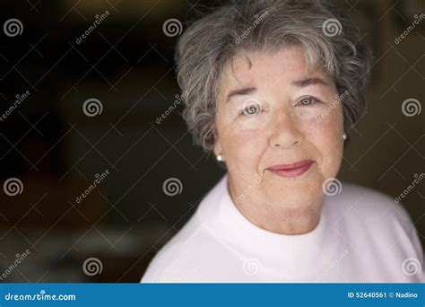 Portrait Of A Senior Woman Smiling At The Camera Stock Image Image Of