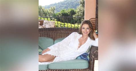 Elizabeth Hurley Shows Cleavage As She Wears Outfit From Clothing Line
