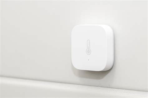 Premium Photo Smart Heat Sensor On The White Wall