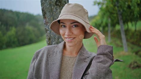 Cute Woman Smiling Camera At Cloudy Green Landscape Close Up Girl