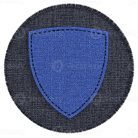 A Blue Shield Shaped Patch With Textured Fabric Design Is Centered On