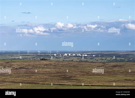 Yorkshire Dales With Wind Turbines And The White Radomes Of Royal Air