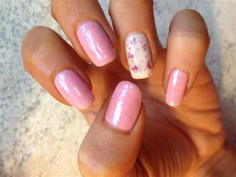 Shellac Nail With Flower Accent And Hot Pink Glitter