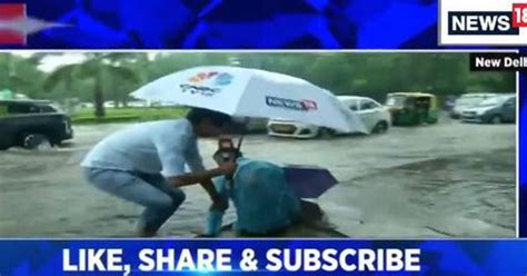 Caught On Live Tv Man Falls Into Flooded Open Drain During Reporters Coverage Of Delhi Rains